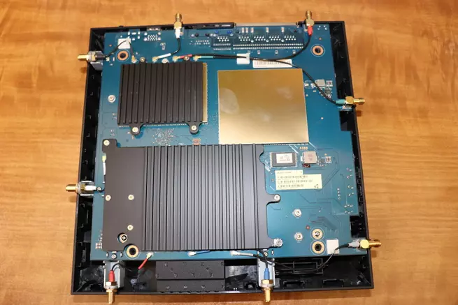 Internal components of the ASUS ROG Rapture GT-AX11000 router in detail